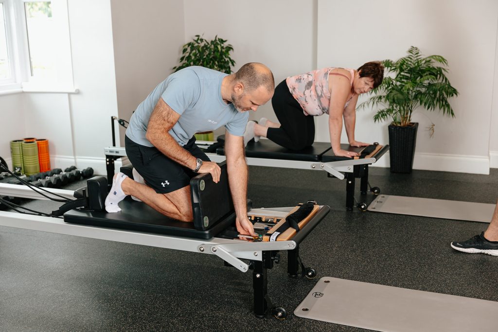 How Reformer Pilates Can Help With Back Pain | Hatt clinic